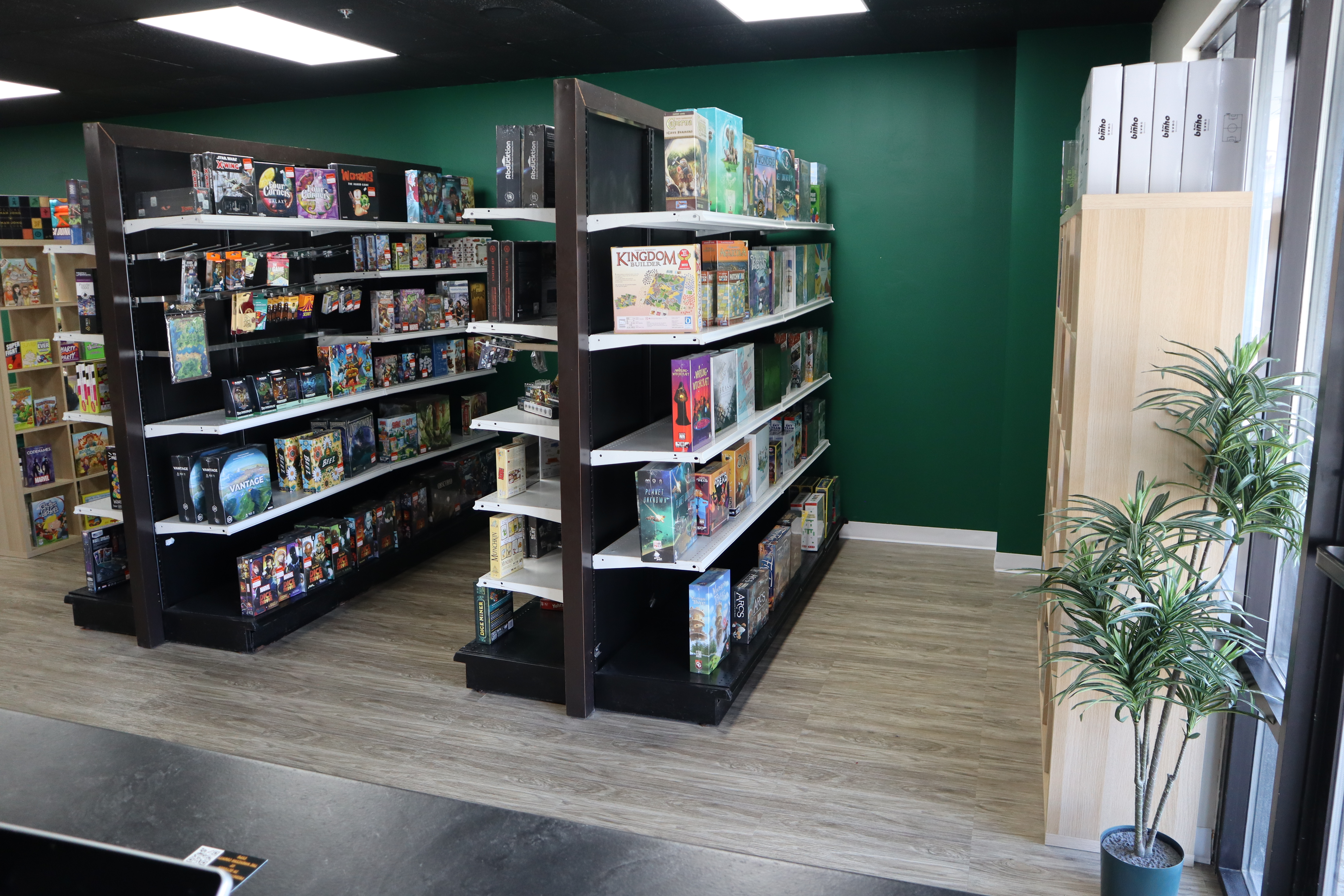 Game retail area at Beyond The Board featuring shelves filled with ...